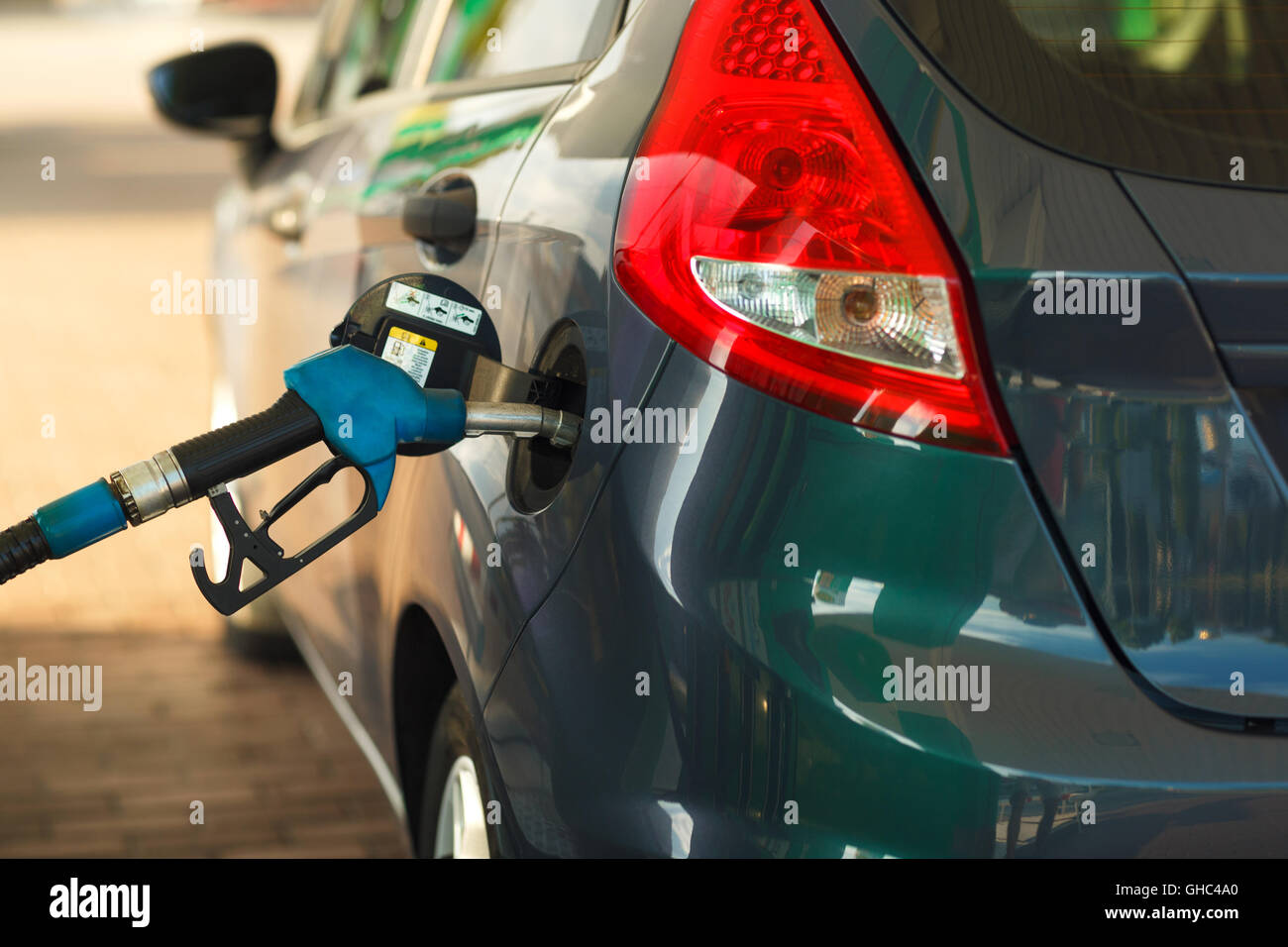 Car refueling on a petrol station closeup Stock Photo - Alamy