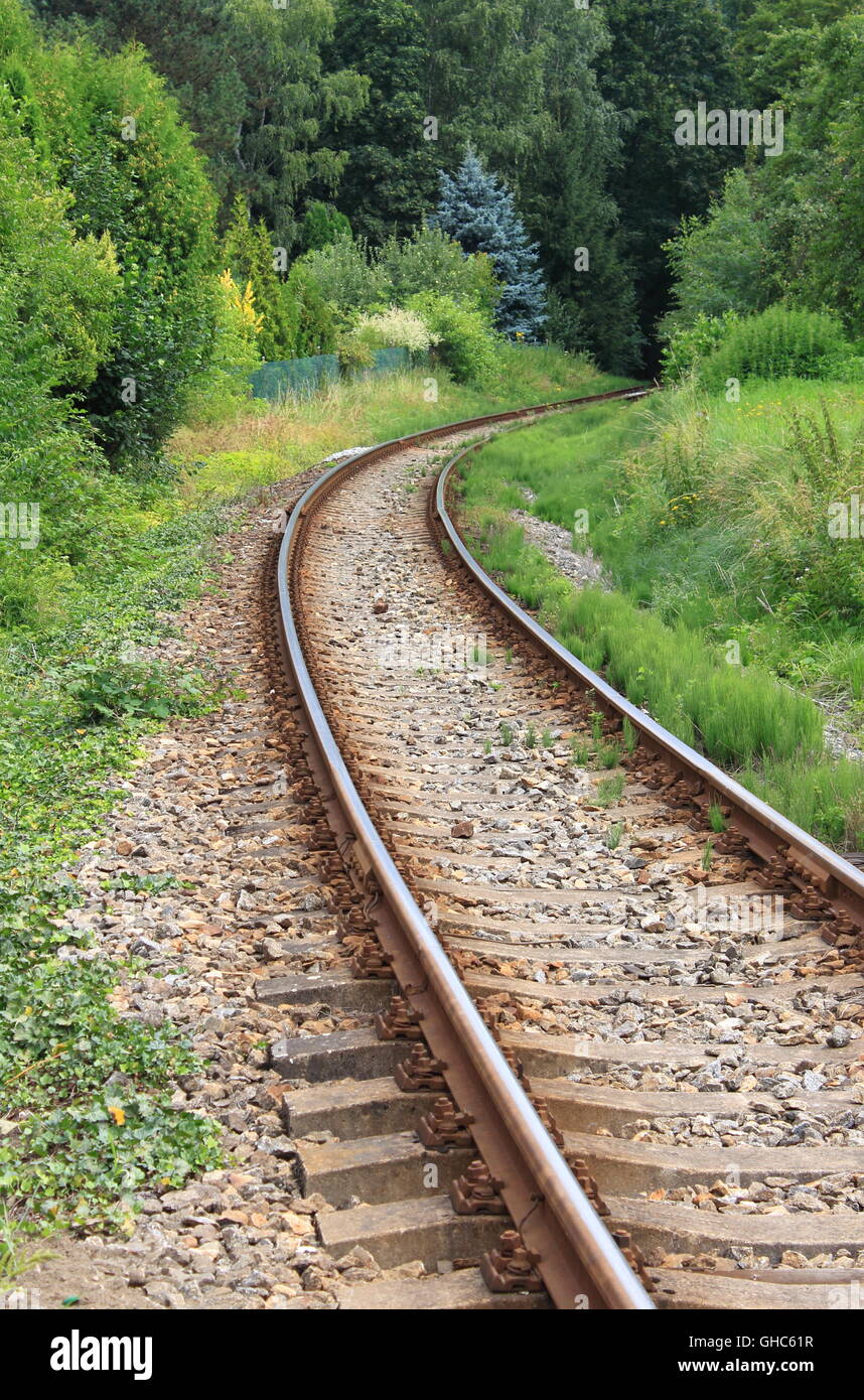 Railway line disappearing into a curve Stock Photo - Alamy