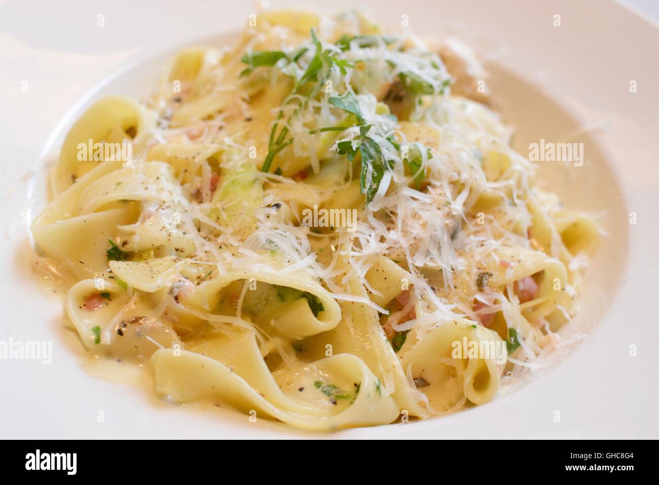 Tagliatelle pasta with cheese sauce Stock Photo - Alamy
