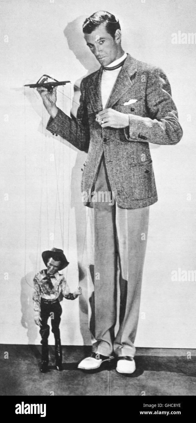 GARY COOPER playing with puppet (1930er Stock Photo - Alamy