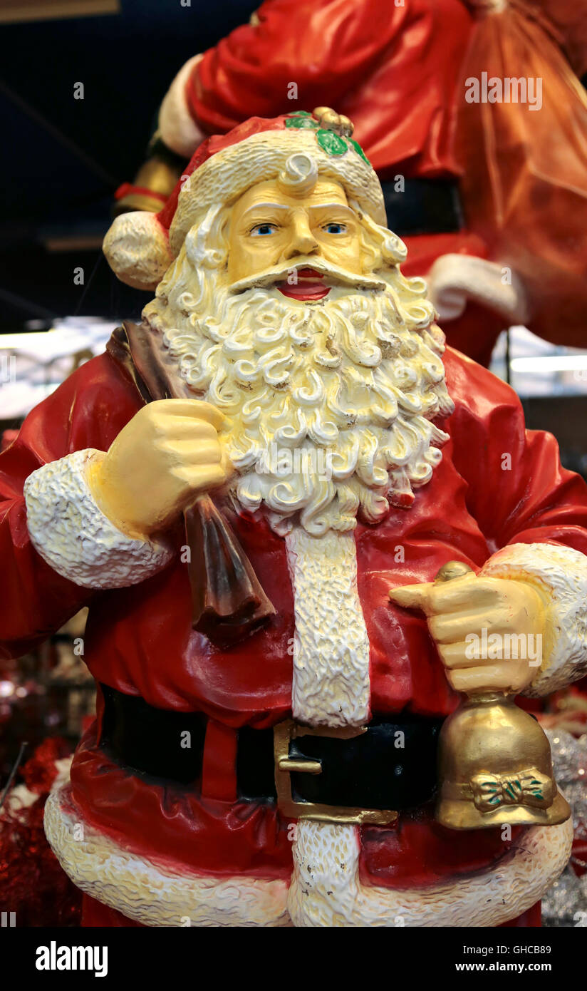 A Santa Claus with a bell Stock Photo - Alamy