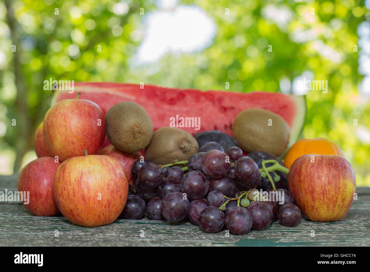 fruits in wooden table, outdoor Stock Photo - Alamy
