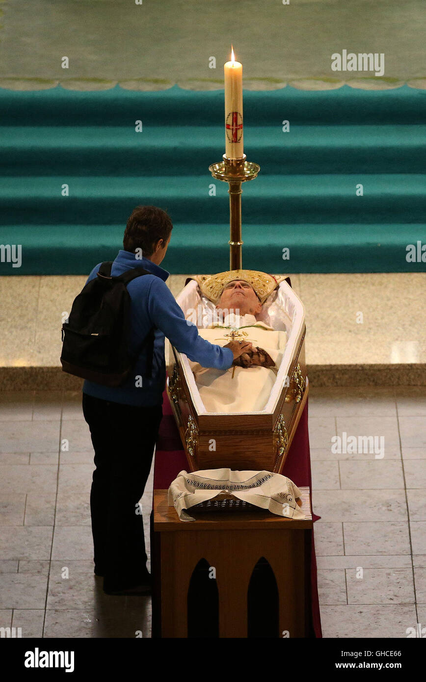 People pay their respects to the late Dr Edward Daly, Bishop of Derry ...