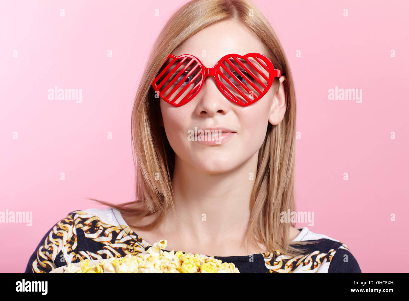 beautiful girl with popcorn Stock Photo - Alamy