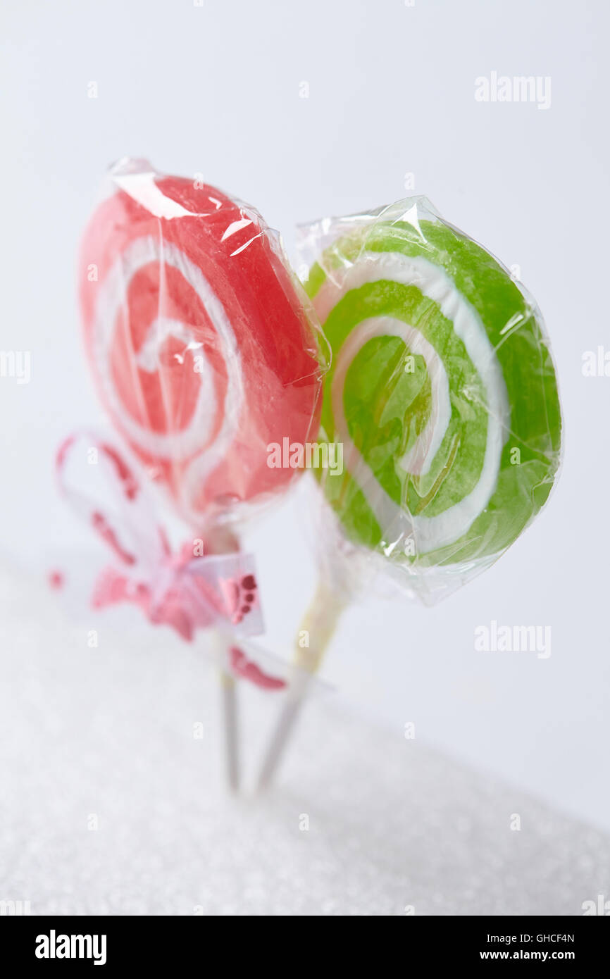 candy on a stick on a white background Stock Photo - Alamy