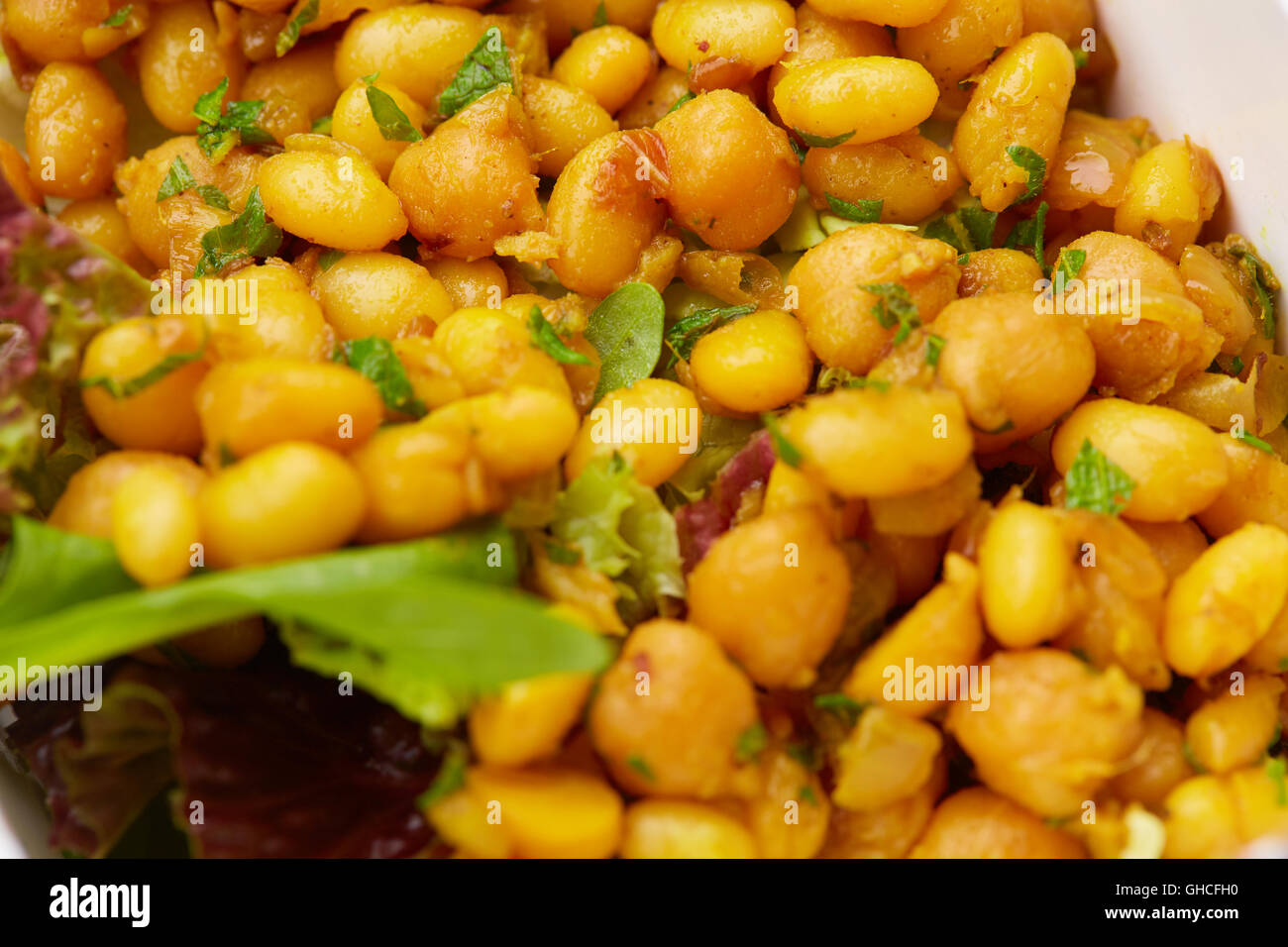 beans and vegetables with turmeric Stock Photo - Alamy