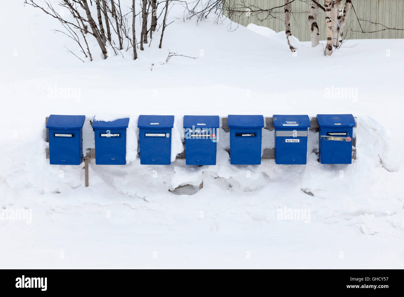 Seven blue Swedish Postal service letter boxes Stock Photo - Alamy