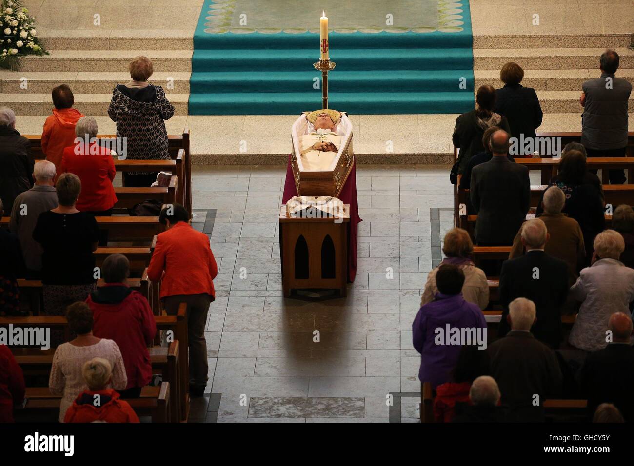 People pay their respects to the late Dr Edward Daly, Bishop of Derry ...