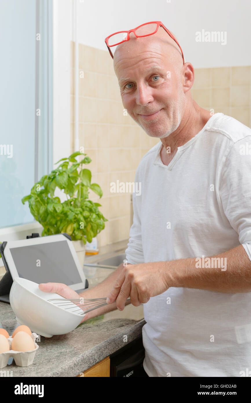 a mature man in the kitchen Stock Photo - Alamy