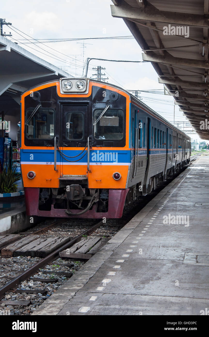 Old diesel railcar of the local train is ready to go on the platform of ...