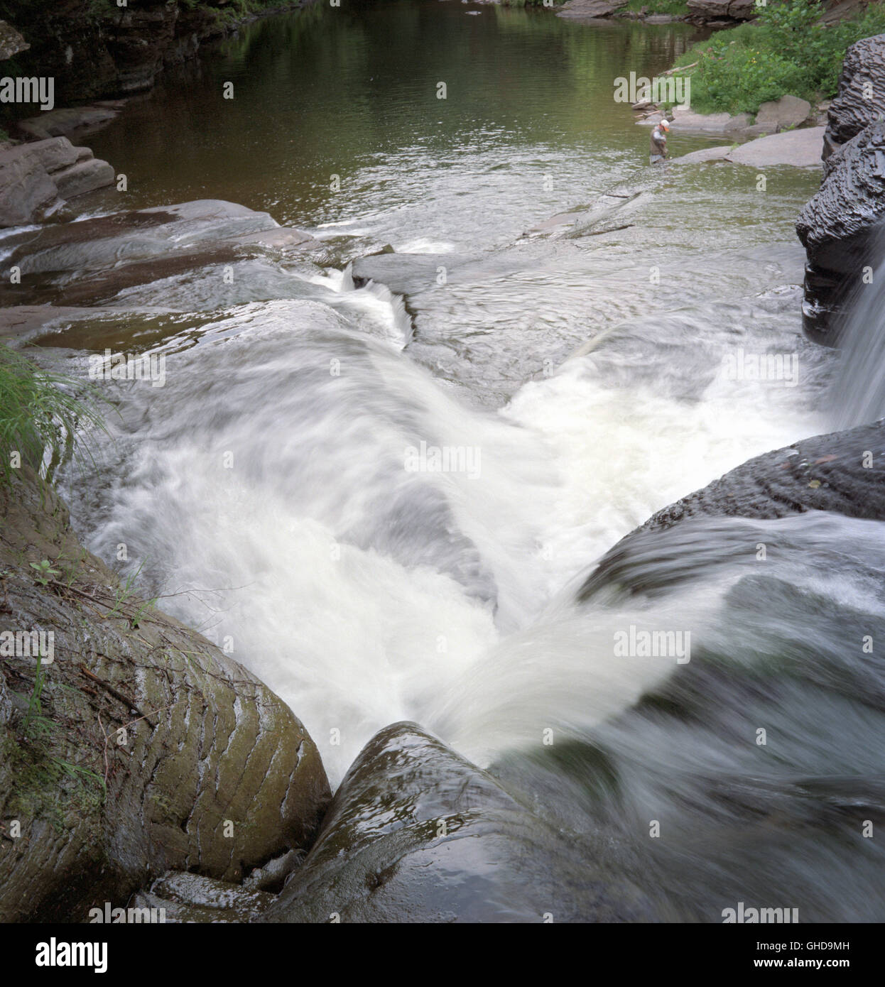 Rapids and waterfall in a river in Pennsylvania. (Shoot with film on a ...