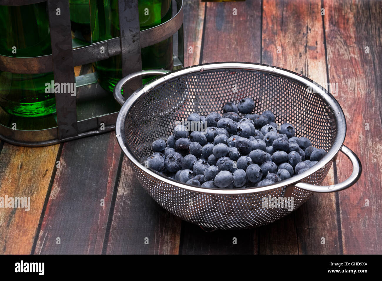 Fresh blueberries in colander hi-res stock photography and images - Alamy