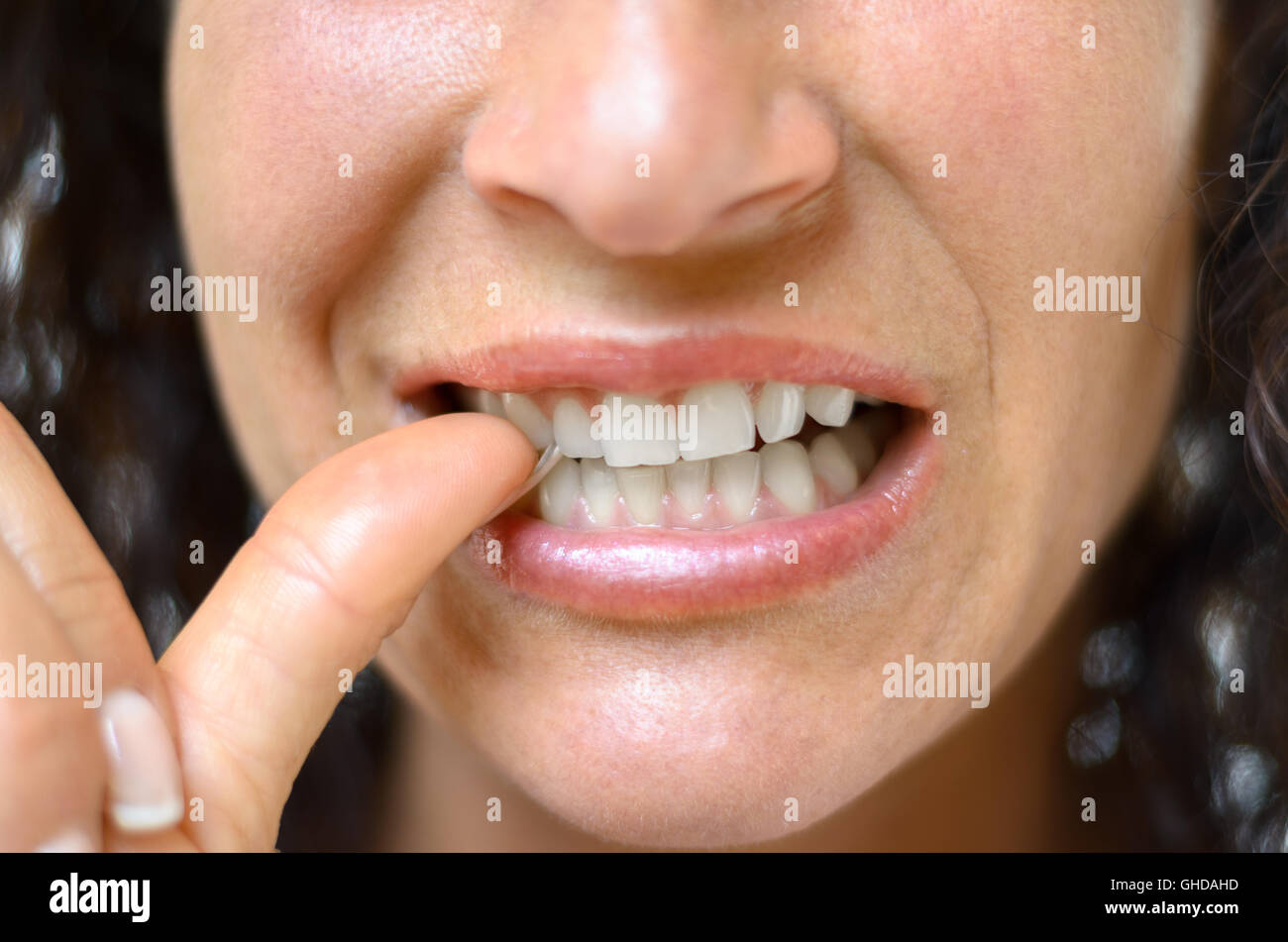 Biting thumb hi-res stock photography and images - Alamy