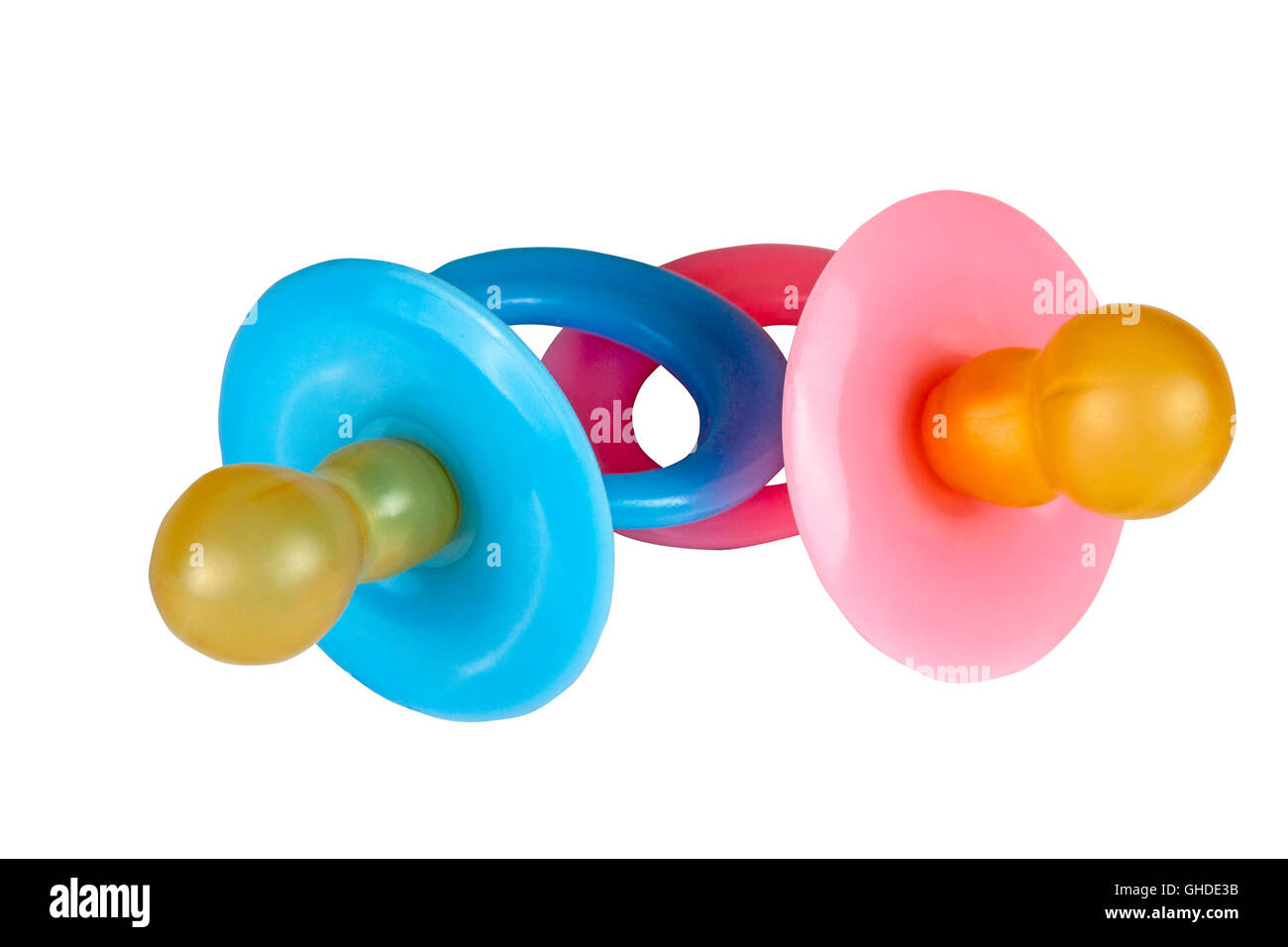 Close up isolated pair of blue and pink baby pacifier dummies in on ...