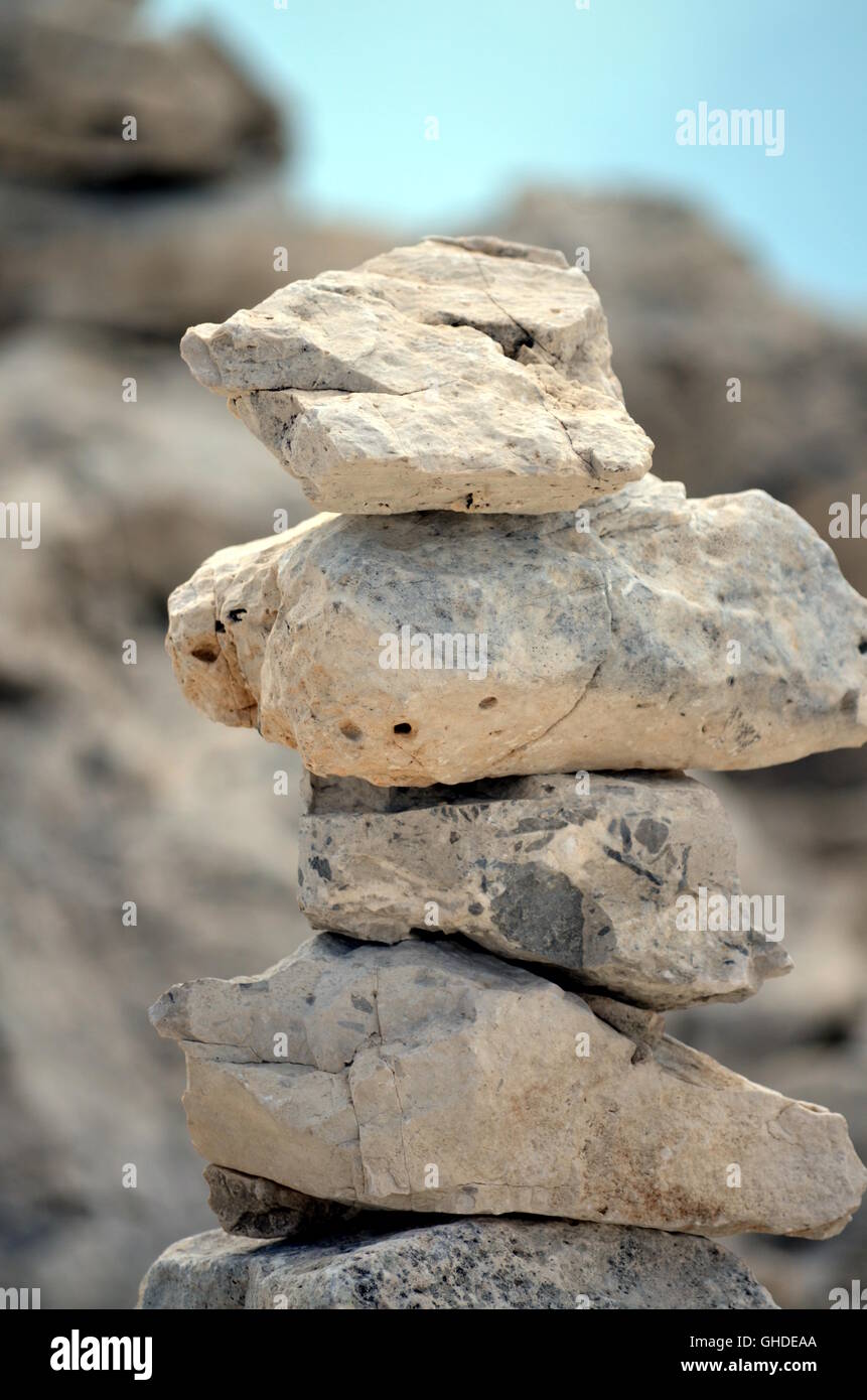 Pyramid on mountainside stability equilibrium hi-res stock photography ...