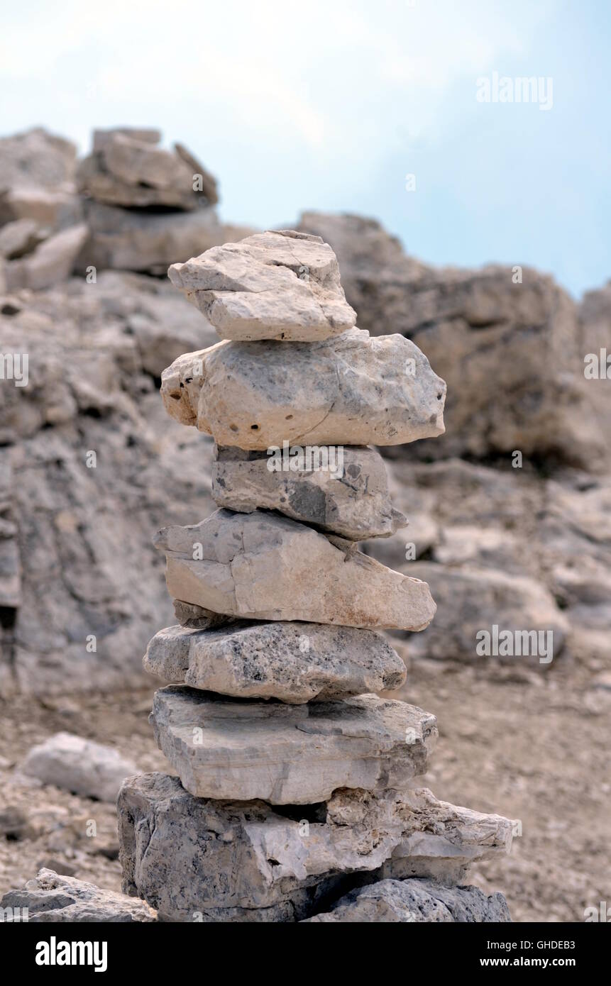 Pyramid on mountainside stability equilibrium hi-res stock photography ...