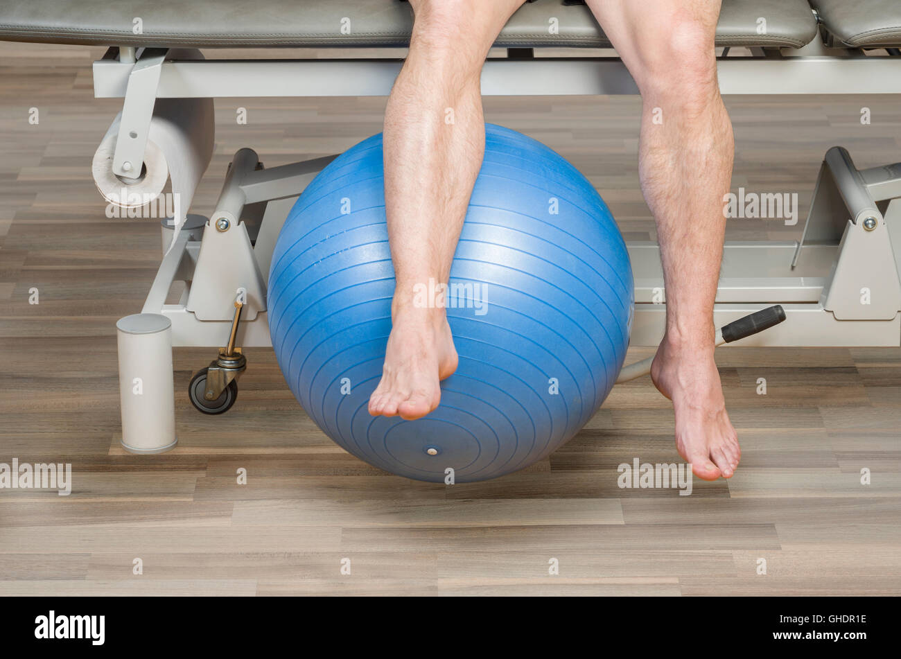 Patient is doing an active exercise of tight hamstrings Stock Photo - Alamy