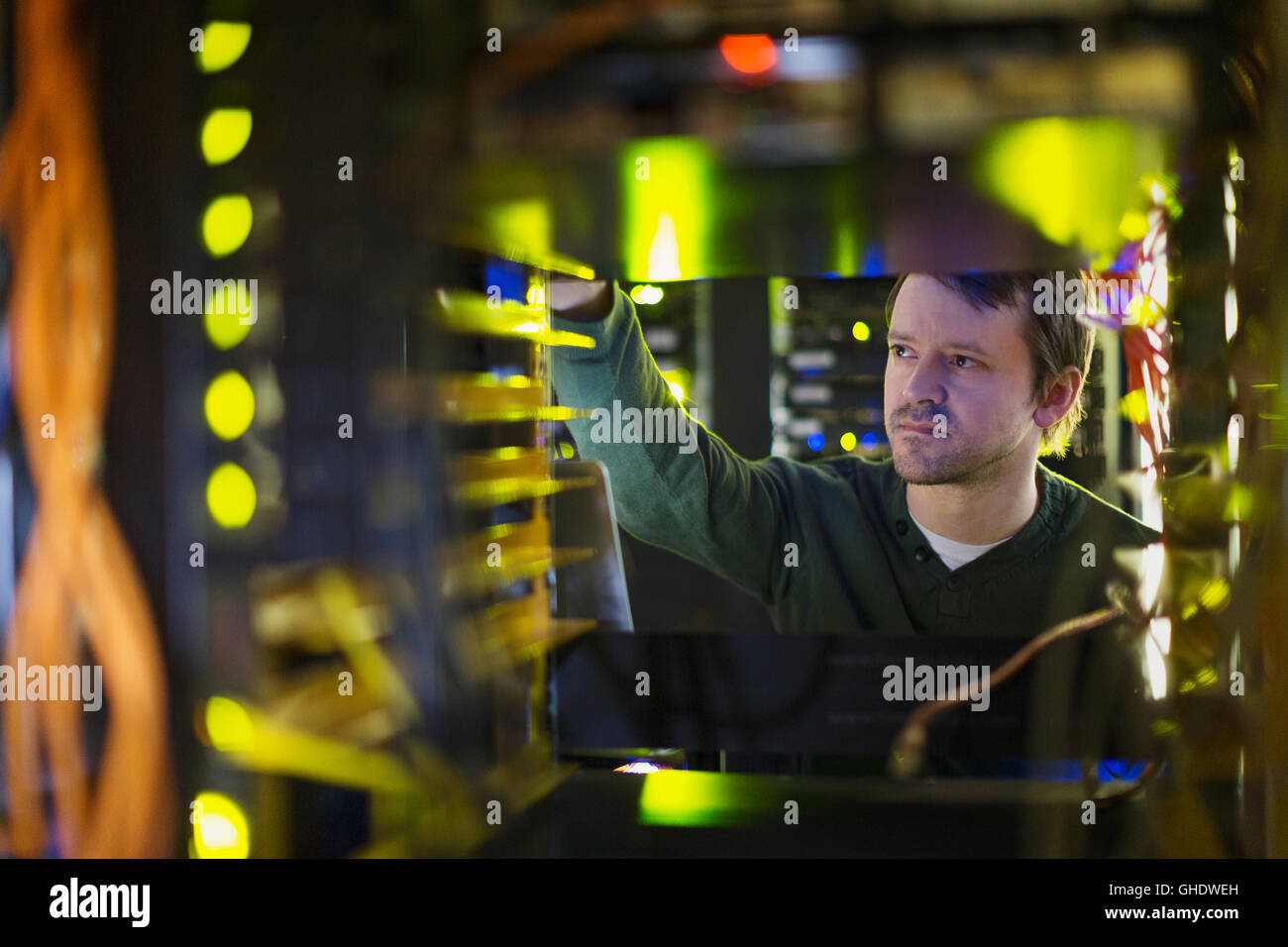 Server room technician working on server panel Stock Photo - Alamy