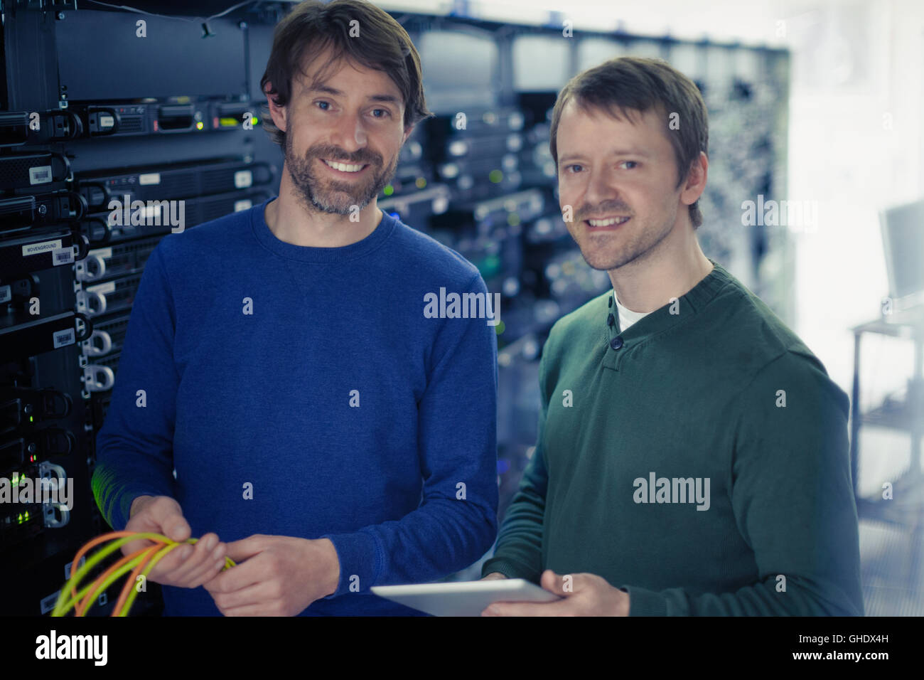 Portrait confident server room technicians Stock Photo - Alamy