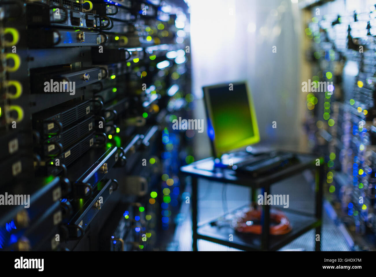 Computer on cart in server room corridor Stock Photo - Alamy