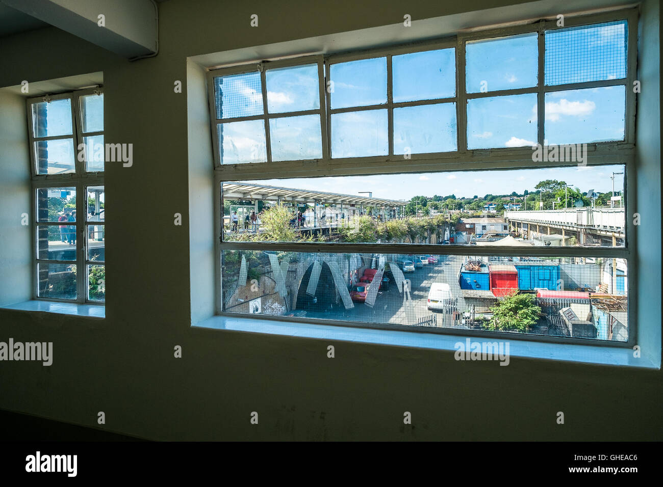 Through a window of Peckham Rye train station looking down onto the ...