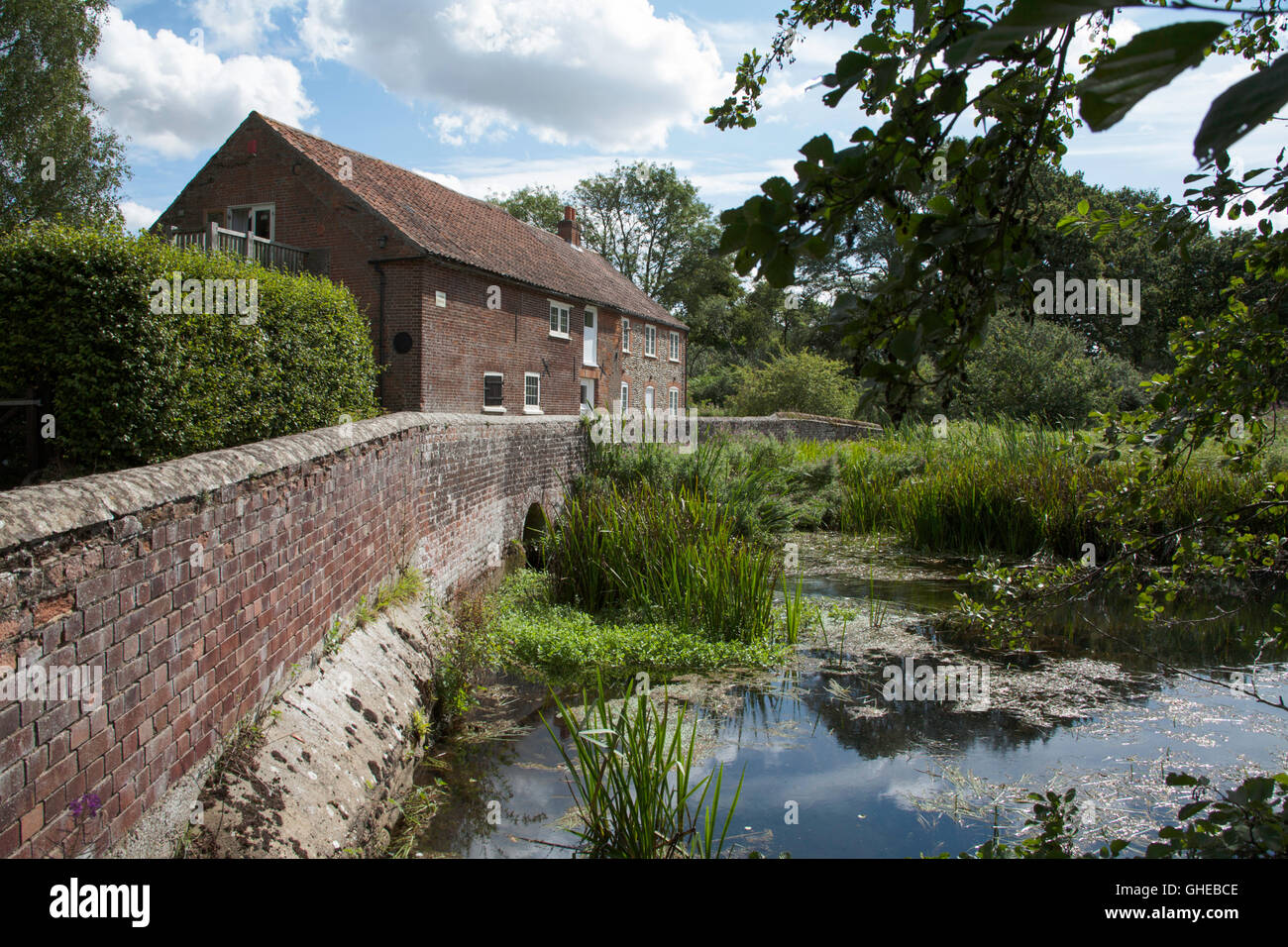 Converted mill on the River Nar at a small hamlet near Fiddler's Green ...