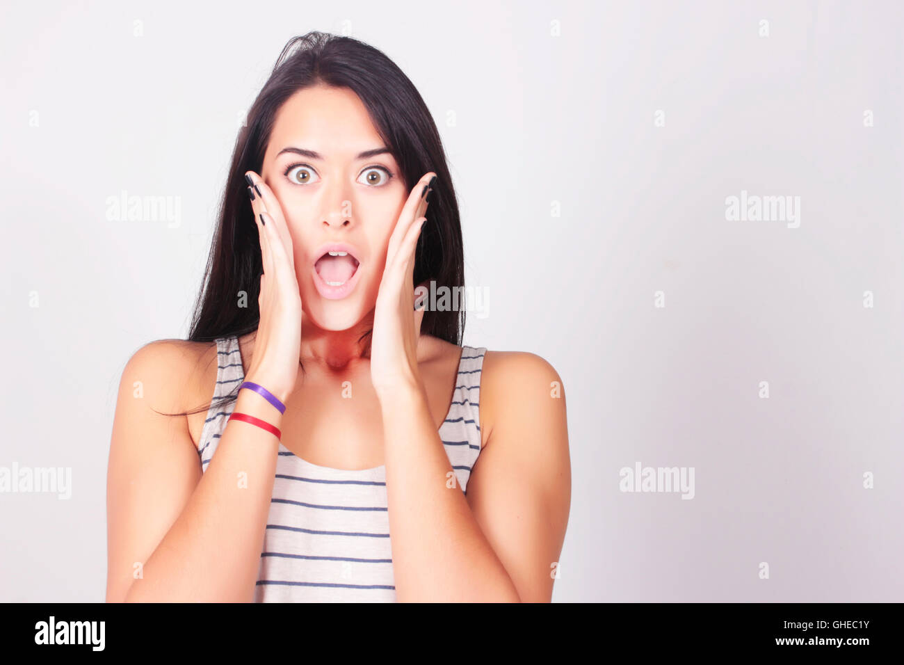 Portrait of young caucasian woman with surprised expression Stock Photo ...