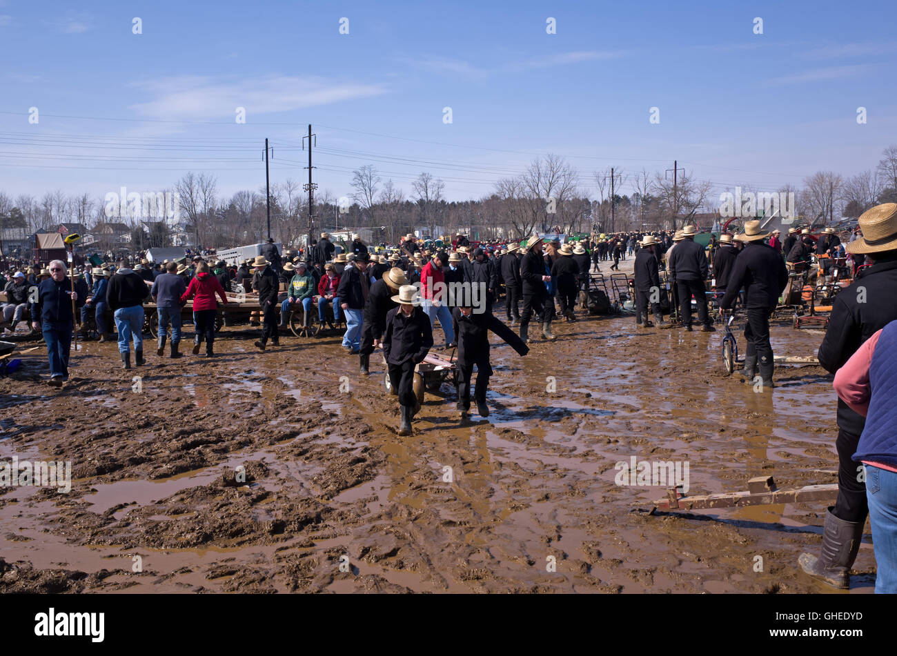 Amish and English shopping at the annual mud sale to benefit a fire ...