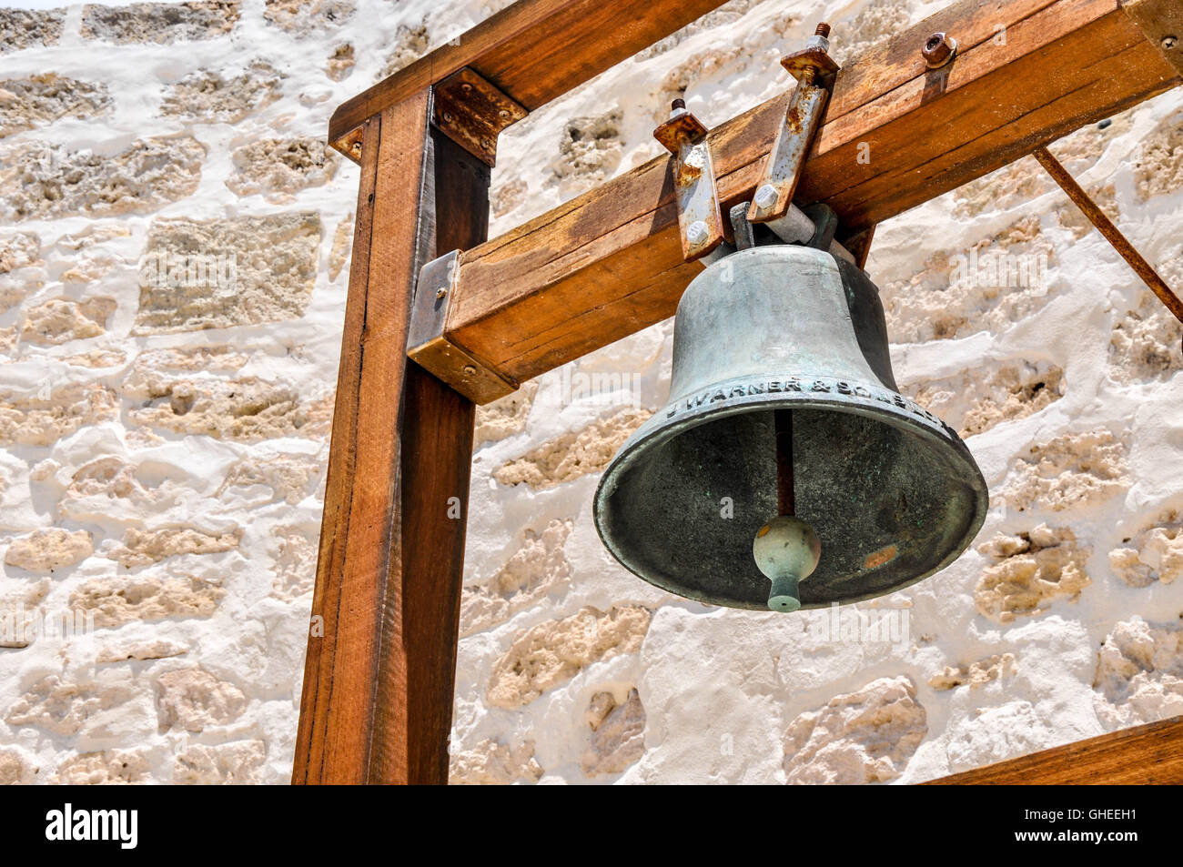 Replica curfew bell on wooden stand in the courtyard at the Round House ...