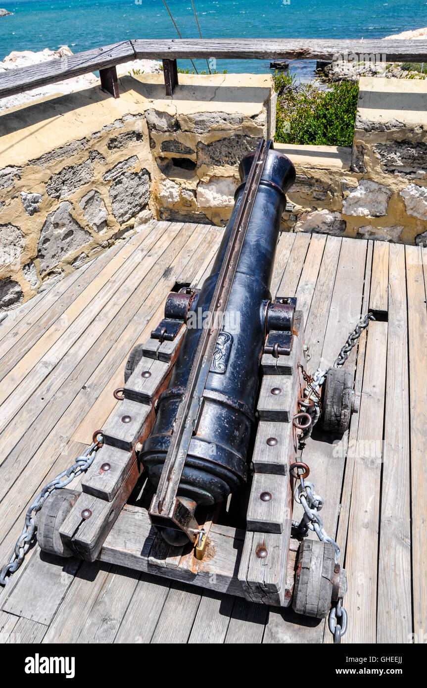 Old replica black cannon on mount on balcony decking at the Round House ...
