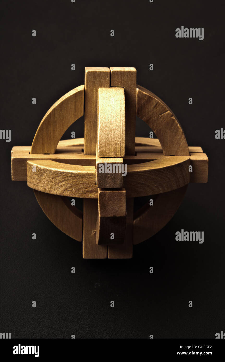 wooden brain teaser Stock Photo - Alamy