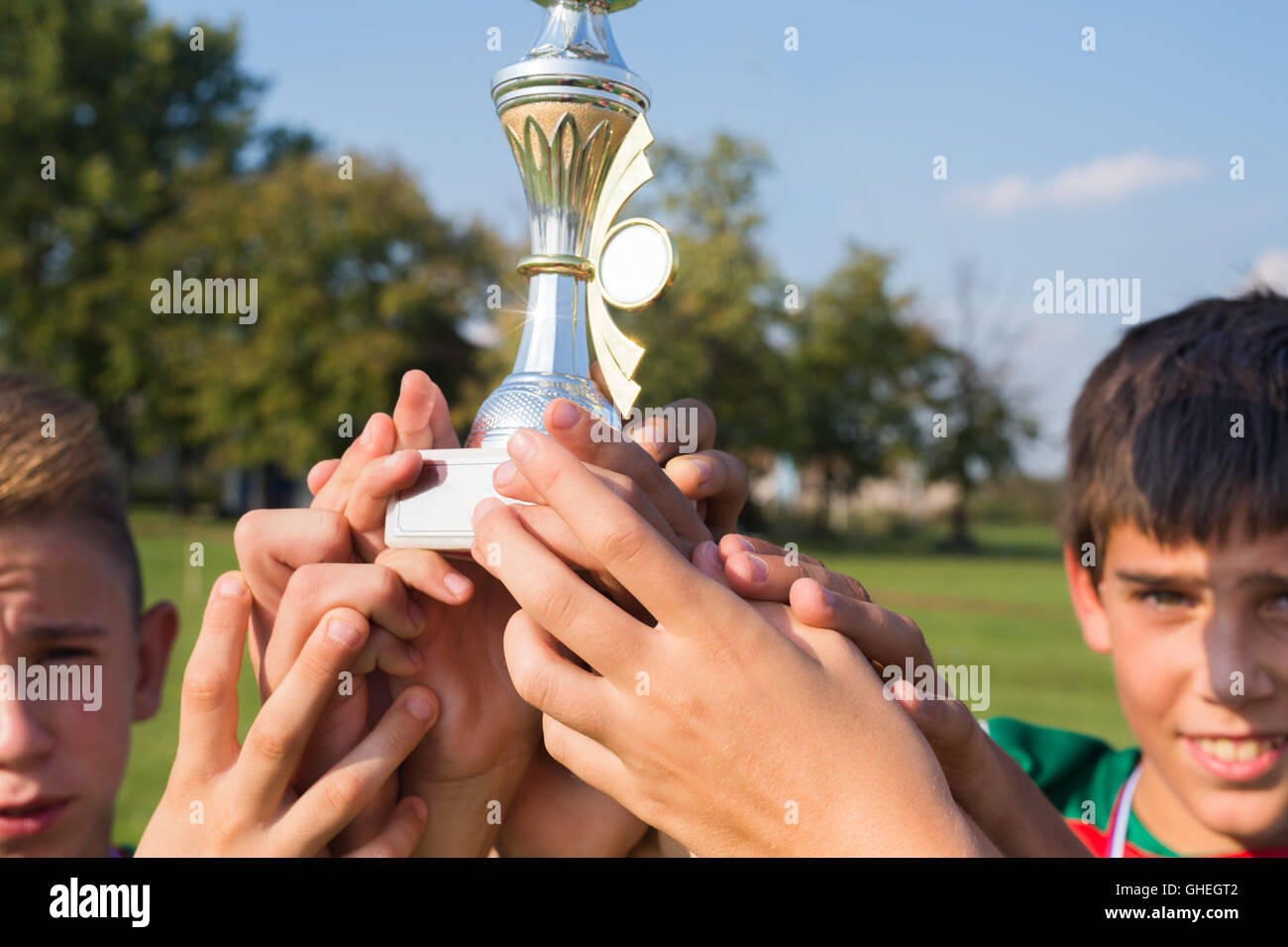 Celebration winners trophy cup football football hi-res stock ...