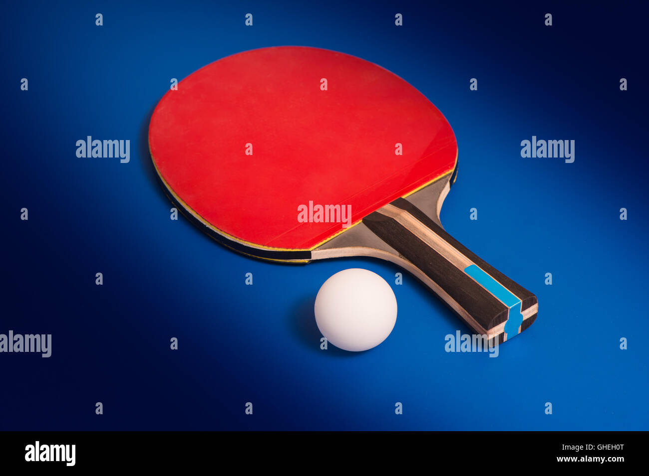 Tabletennis racket and ball on table Stock Photo - Alamy