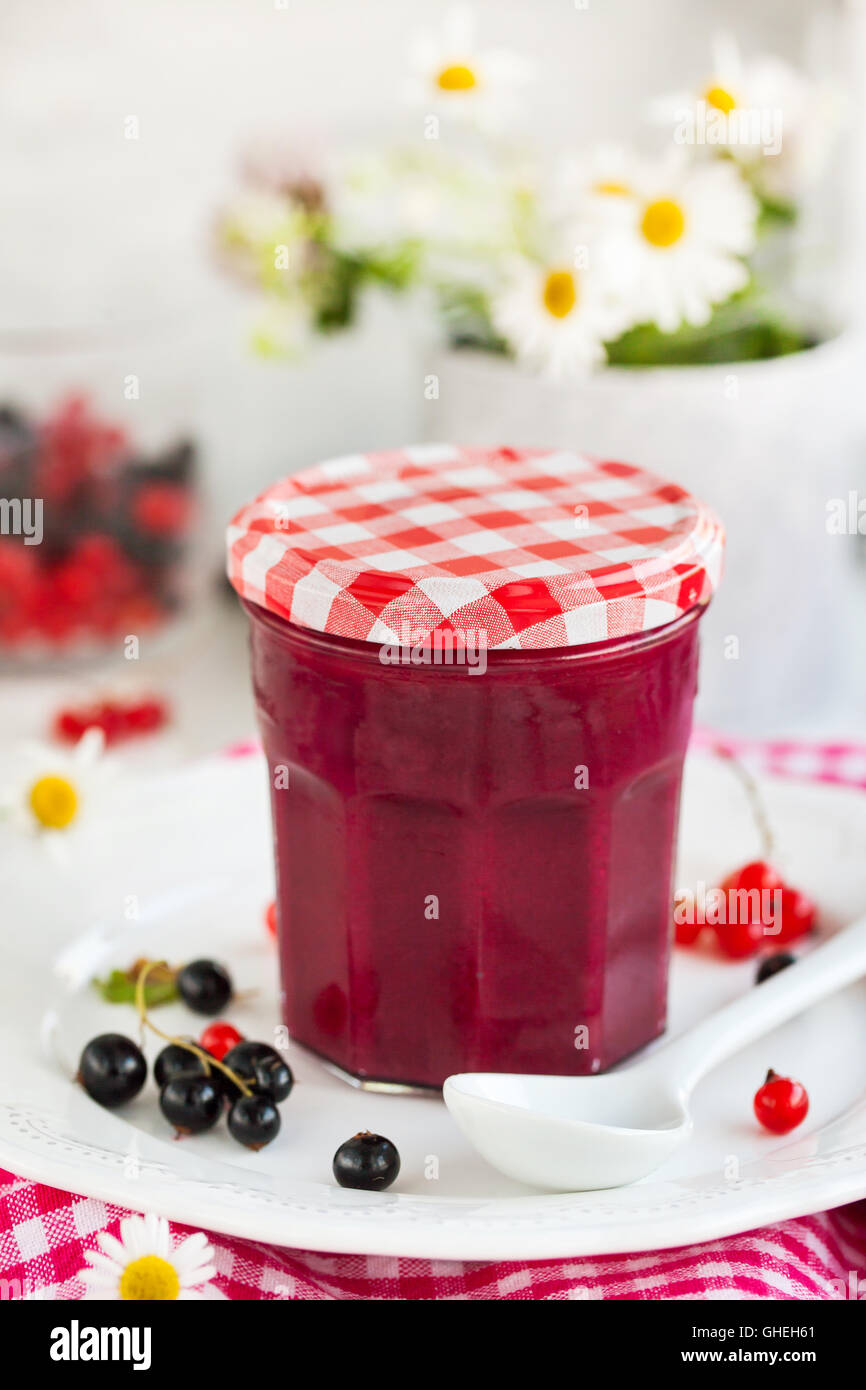 Jar of delicious homemade black currant curd (jam Stock Photo - Alamy