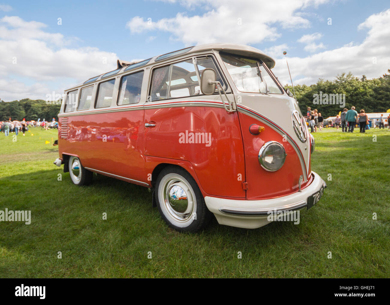 front view of classic orange VW camper van Stock Photo - Alamy