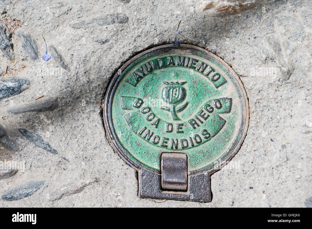 Lid of Granada city water access with the city's symbol, the ...