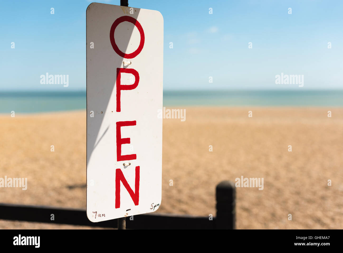A hand made and hand painted open sign on a beach shop Stock Photo - Alamy