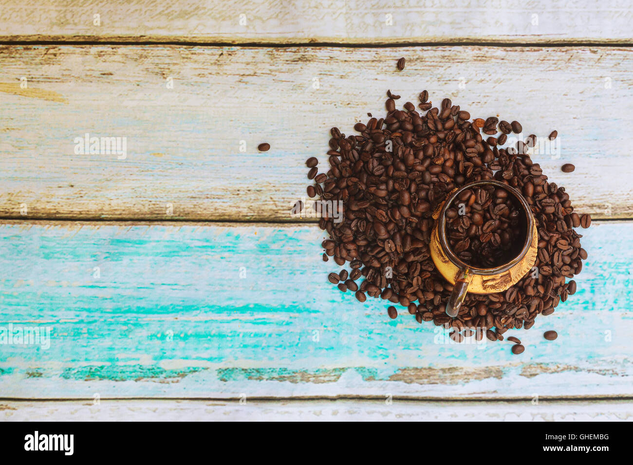 Roasted coffee beans and a cup coffee beans for a coffee cup Stock ...