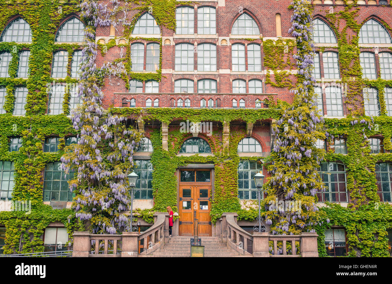 a student at the big staircase in front of university library in Lund ...