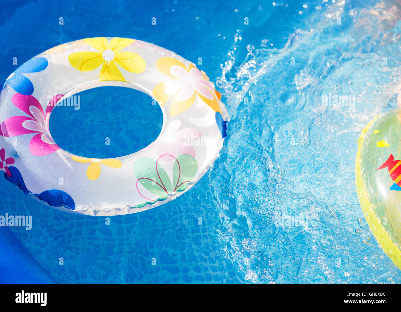 Inflatable swimming circle in open air pool in summer day Stock Photo ...