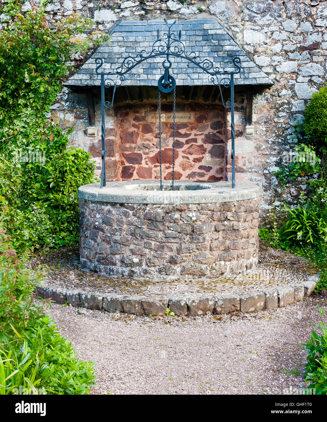 Commemorative wishing well in Memorial Garden of St George Priory ...