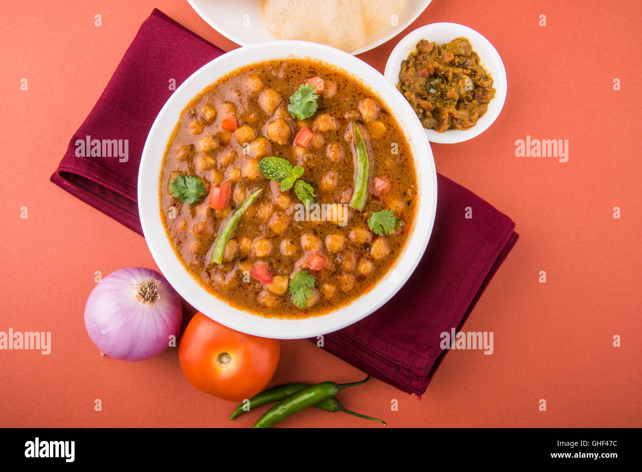 spicy chick peas also known as Chola Masala or Chana Masala or Chole ...