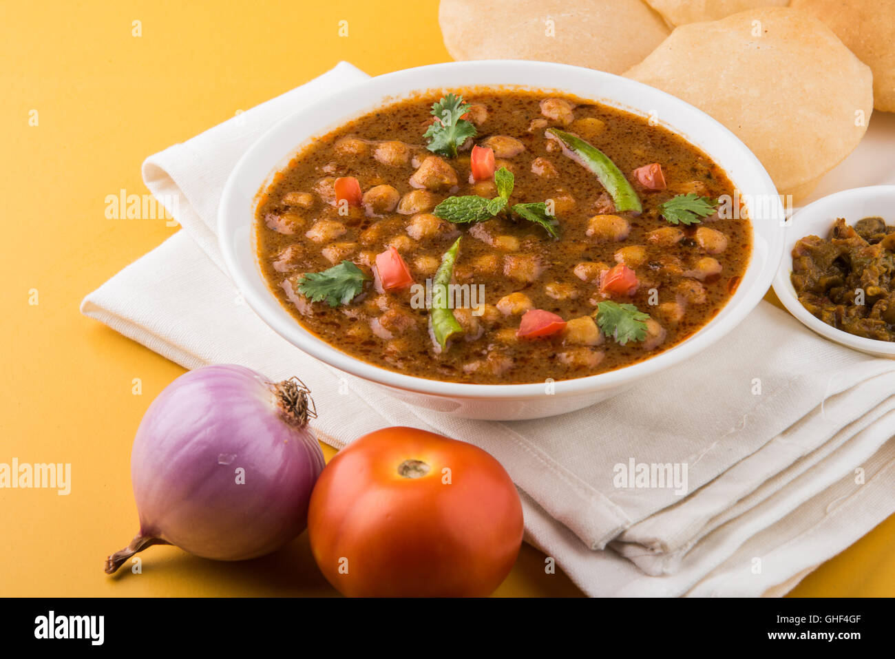 spicy chick peas also known as Chola Masala or Chana Masala or Chole ...