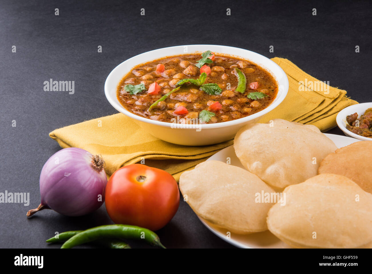 spicy chick peas also known as Chola Masala or Chana Masala or Chole ...