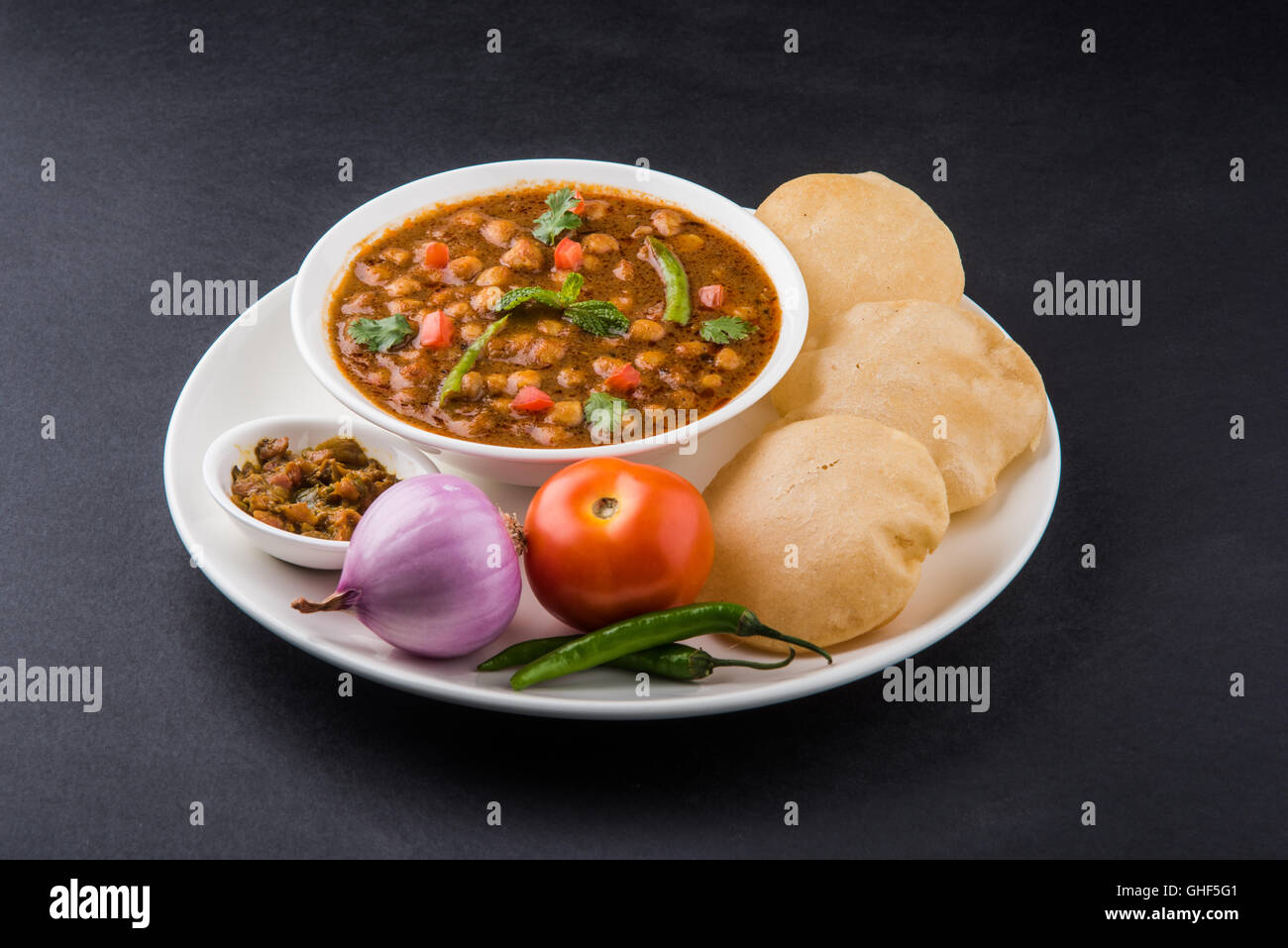 spicy chick peas also known as Chola Masala or Chana Masala or Chole ...