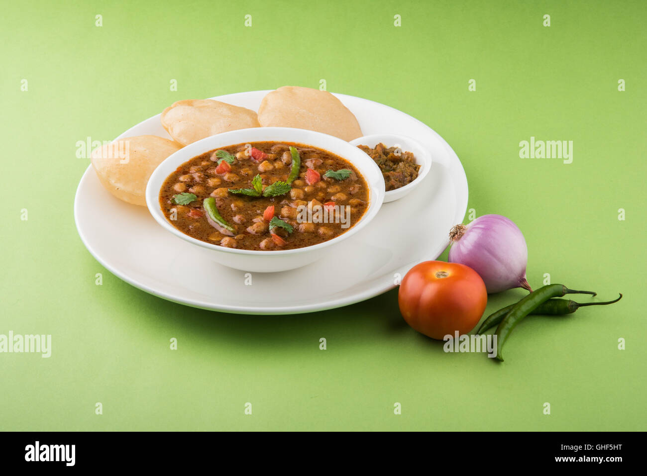 spicy chick peas also known as Chola Masala or Chana Masala or Chole ...