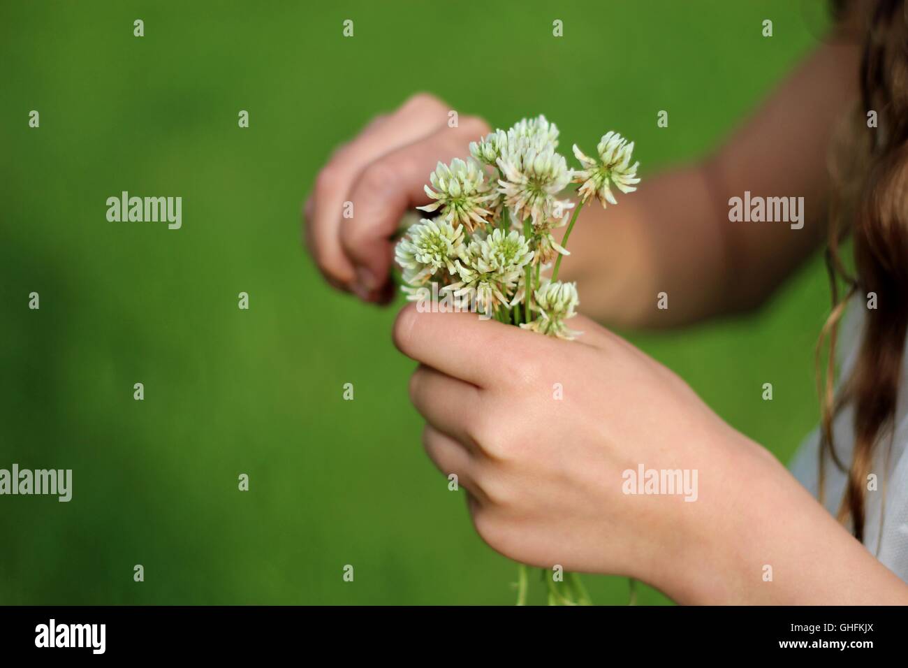 Flowers in girls hands hi-res stock photography and images - Alamy