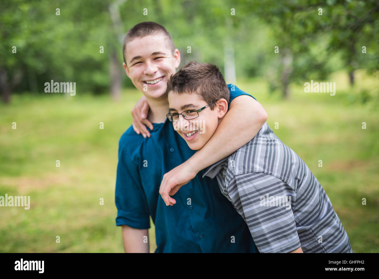 cute brothers outside in forest Stock Photo - Alamy