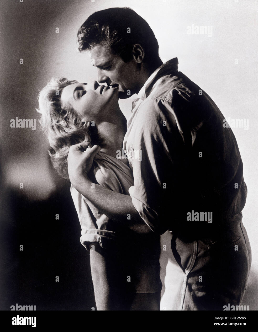 ANGIE DICKINSON (Rachel Cade) and ROGER MOORE (Paul Wilton) in a love ...