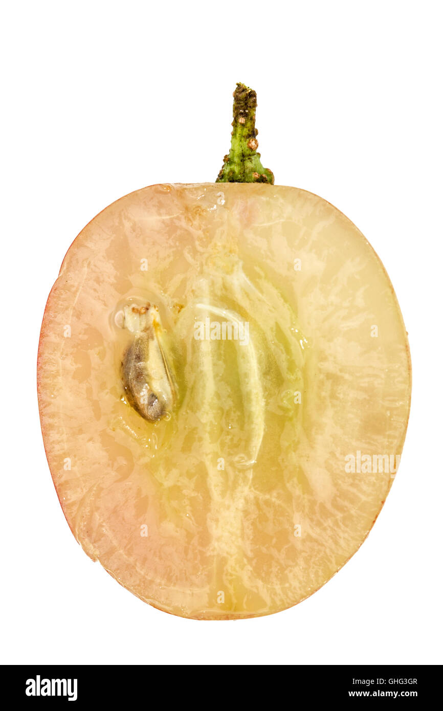 Half of the fruit of the grapes close-up, isolated on white background ...